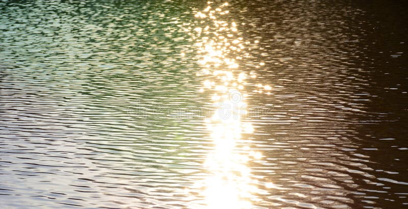 Ripples on the Water and Reflection of the Rays of the Setting Sun ...