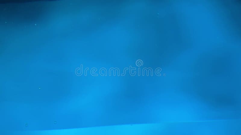 Ripples and Waves Appear on the Blue Water Surface with Dark Highlights ...