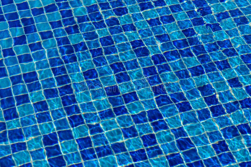 Rippling Blue Water Reflects Sunlight through Tile Patterns in a ...
