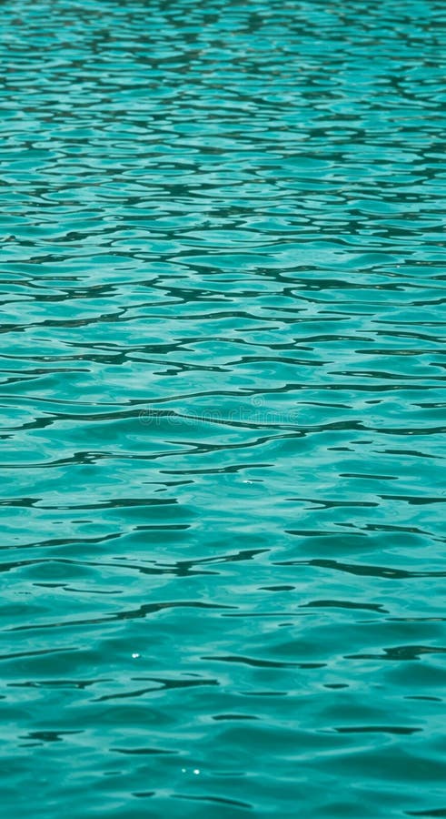 Rippling Turquoise Water Fills the Scene, Capturing the Texture and ...