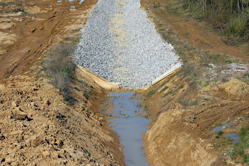 Riprap-lined Drainage Channel in Construction Site Stock Photo - Image ...