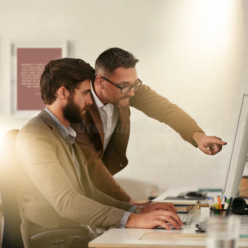 We Rise by Lifting Others. Two Designers Discussing Something on a ...