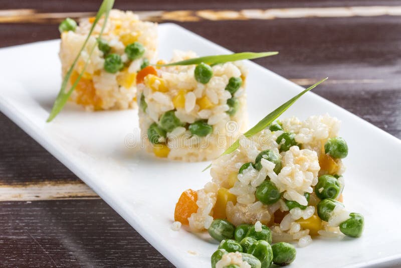 Rise with Vegetables on White Plate Stock Image - Image of dinner, view ...