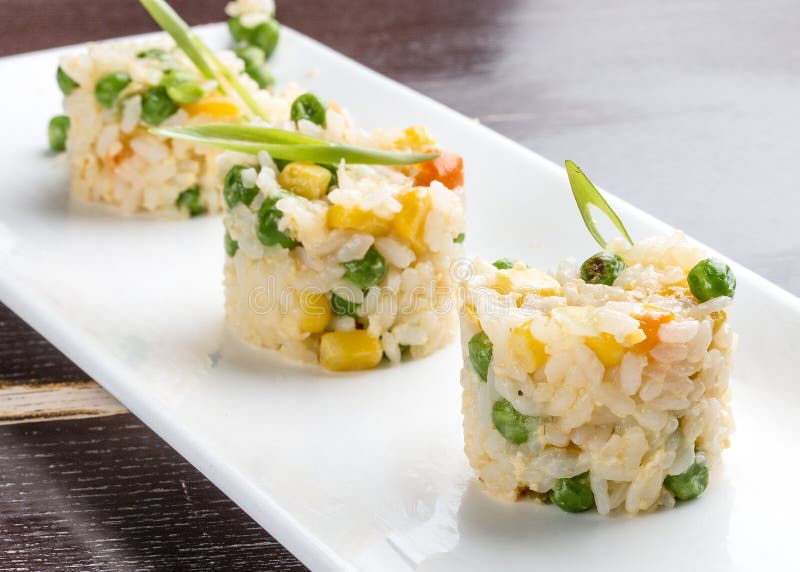 Rise with VegetablesRise with Vegetables on White Plate Stock Image ...