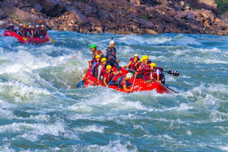 Rishikesh, India - Young People on Adventure White Water River Rafting ... Rishikesh, India - Young People on Adventure White Water River Rafting ...