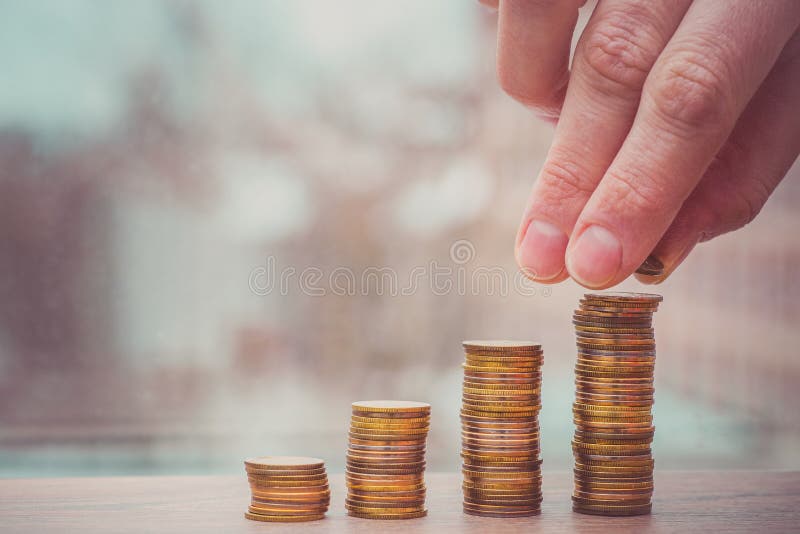 Rising graph made of coins stock photo. Image of black - 94404292