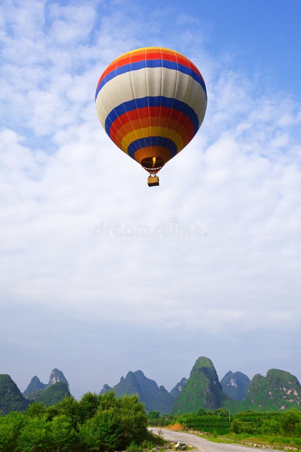 A rising hot air balloon stock photo. Image of huge, ballooning - 11636732