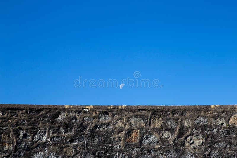 Rising Moon Over Ancient Stone Parapet Wall Stock Photo - Image of ...