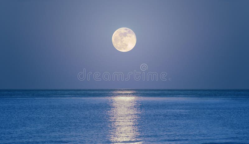 Rising moon on sea stock image. Image of silver, beam - 17826187