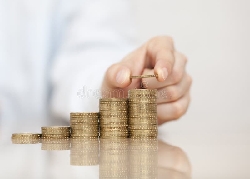 Business Man with Rising Coins Stock Photo - Image of column, capital ...