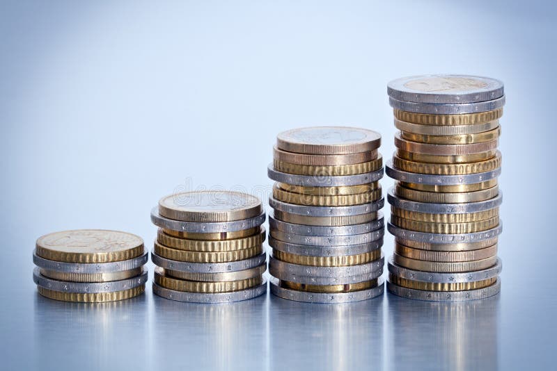 Rising stacks of coins stock image. Image of worth, coin - 21841367