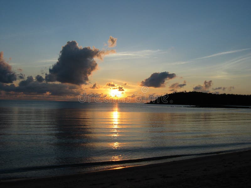 Rising Sun stock image. Image of sunset, water, sunrise - 554077