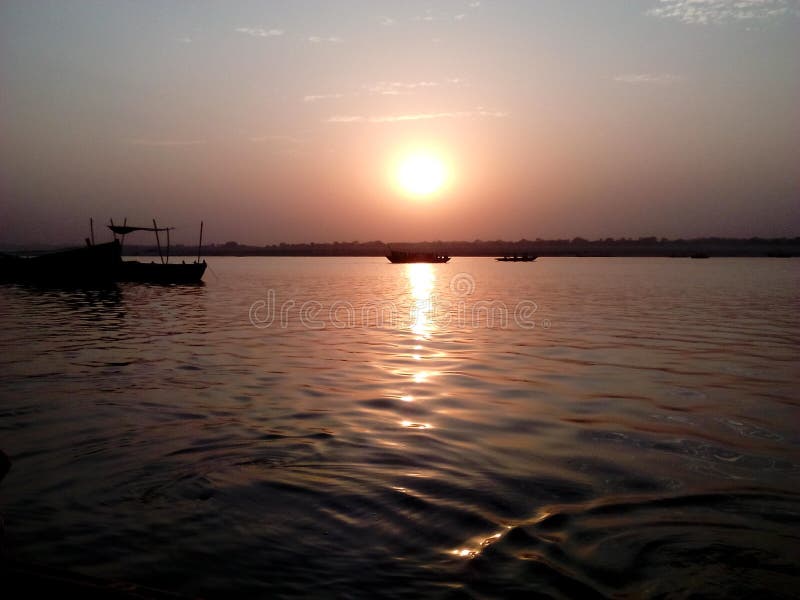 Rising of sun stock photo. Image of river, rising, ganga - 114994172