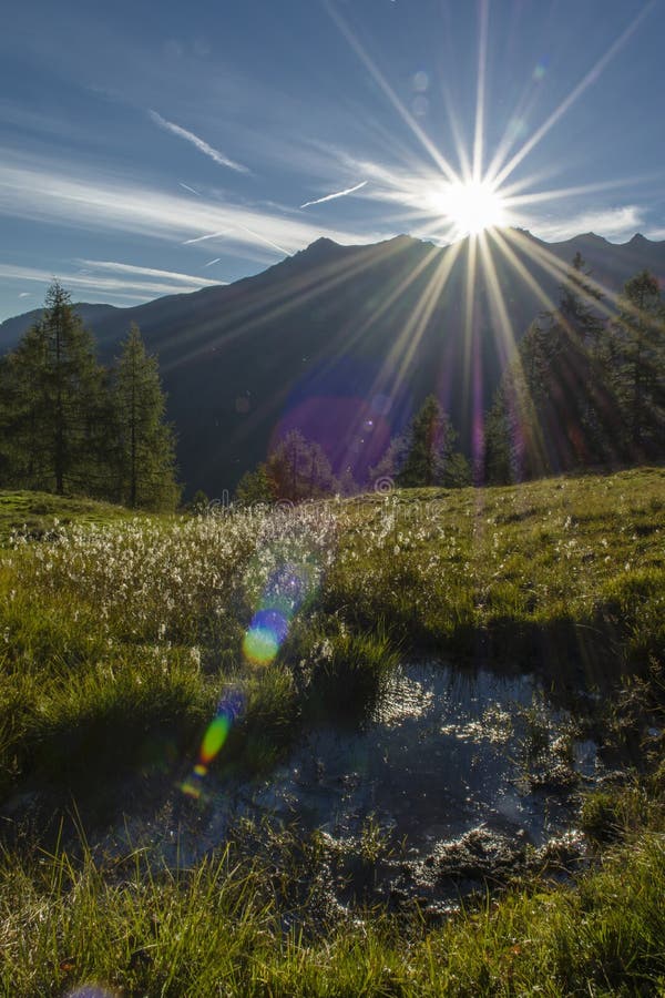 The Rising Sun in the Austrian Alps Stock Image - Image of fields ...