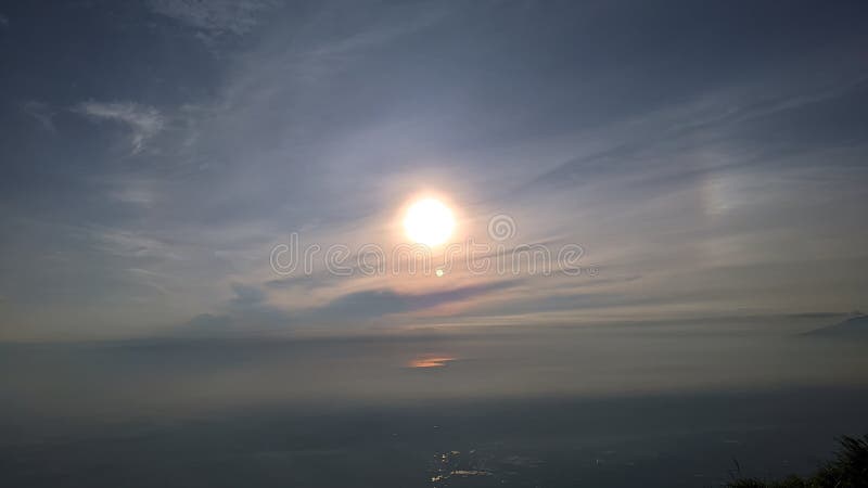 The Rising Sun Can Be Seen Very Clearly at the Top of the Mountain ...