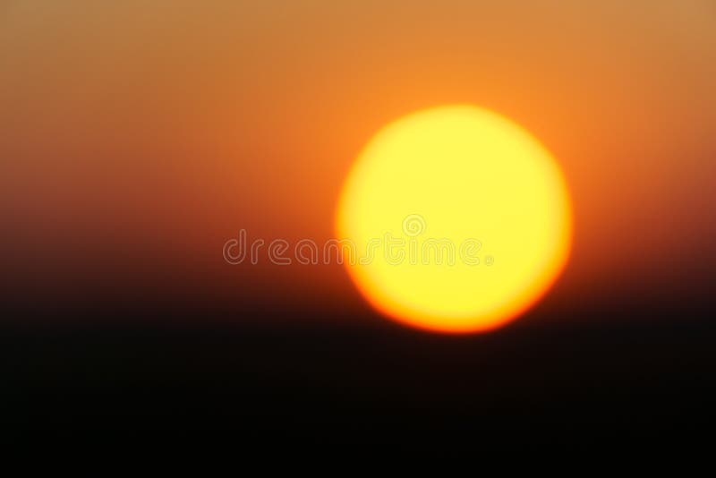 Rising Sun. Close-up Orange Blurry Sun Over the Horizon Stock Image ...
