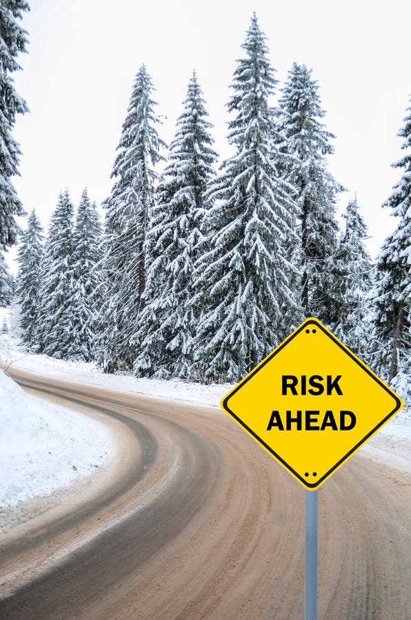 "RISK AHEAD " Sign Against Winter Road Stock Photo - Image of ...