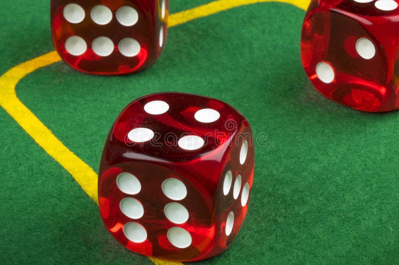 Risk Concept - Playing Dice on a Green Gaming Table. Playing a Game ...