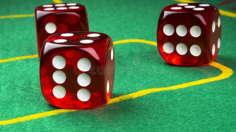 Risk Concept - Playing Dice on a Green Gaming Table. Playing a Game ...