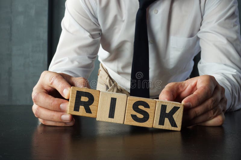 Risk Management Concept is Shown Using the Text on the Wooden Cubes ... Risk Management Concept is Shown Using the Text on the Wooden Cubes ...
