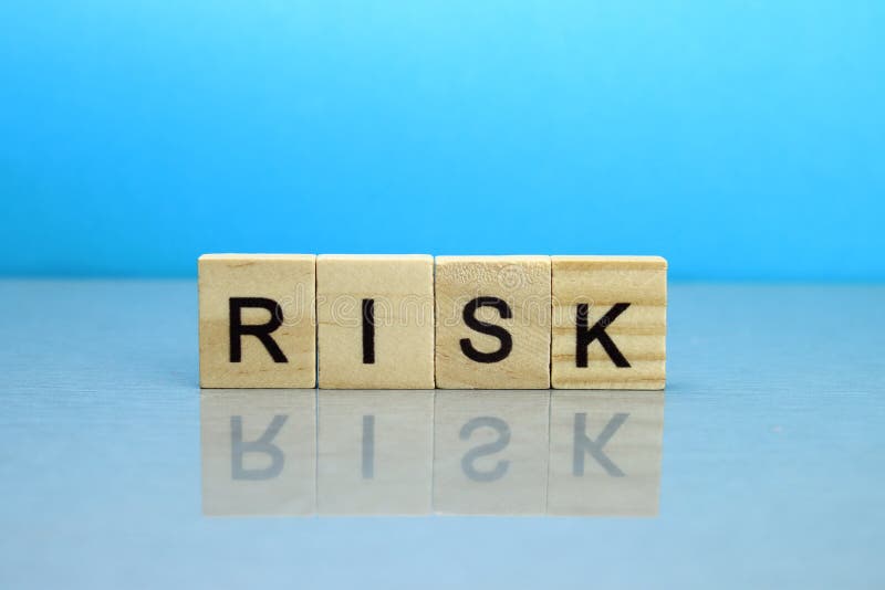 Risk Word Made of Wooden Blocks on a Blue Background Stock Image ...