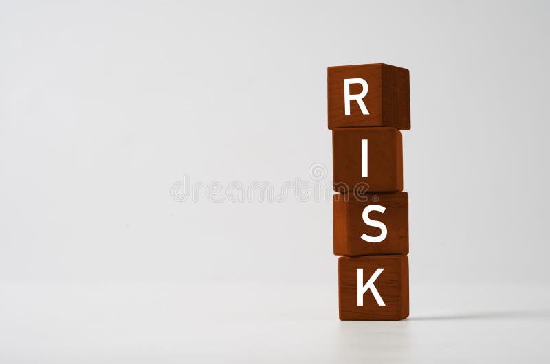 Risk Wording on Red Wooden Cube for Risk Assess Management Concept ...