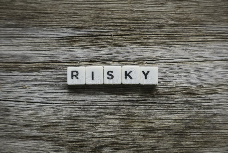 Risky Word Made of Square Letter Word on Wooden Background Stock Photo ...