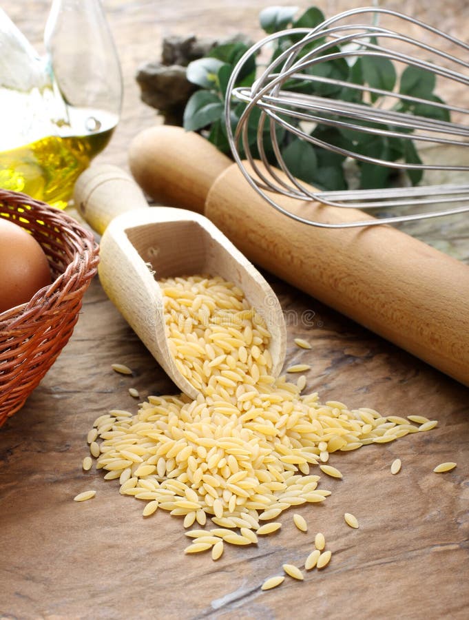 Risoni - Italian raw pasta stock photo. Image of food - 23507996