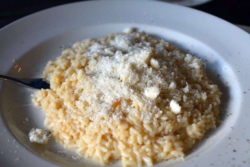 Risotto with Cheese Sauce and Parmesan Stock Image - Image of cheese ...