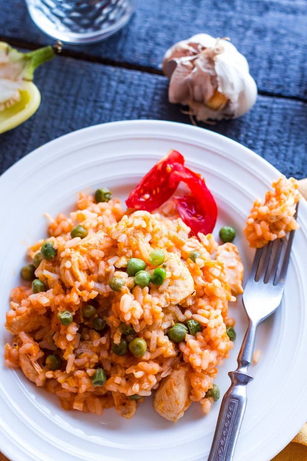 Risotto with Chicken and Vegetables on a Plate with Fork Stock Photo ...
