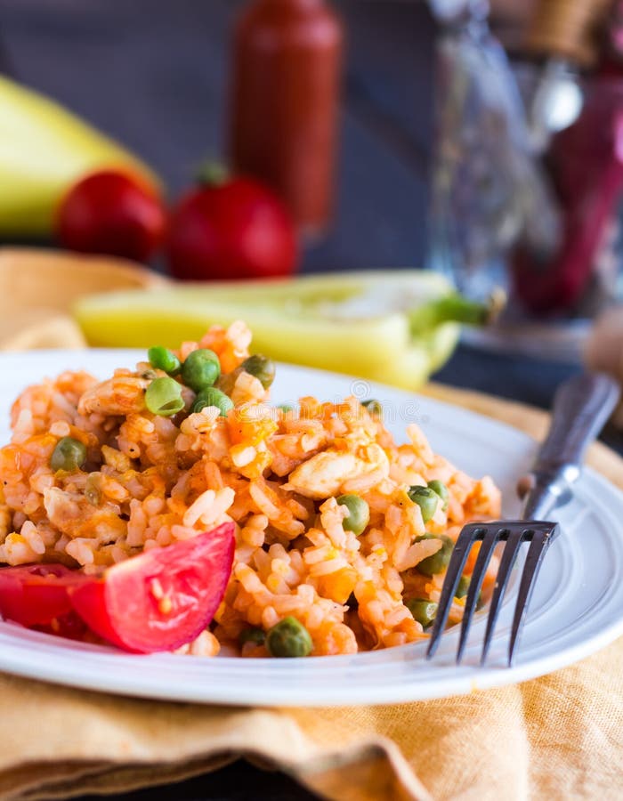 Risotto with Chicken and Vegetables on a Plate with Fork Stock Image ...