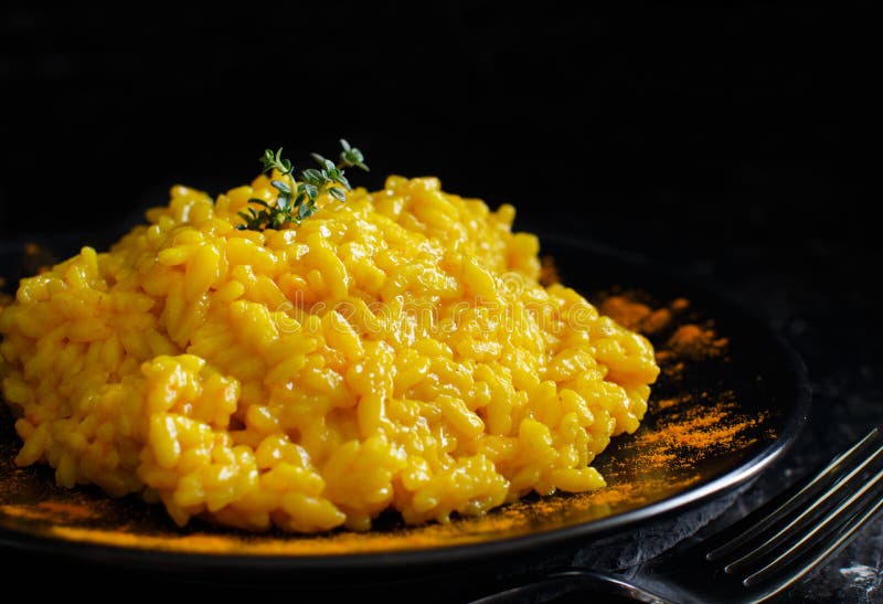 Risotto with Curcuma on a Dark Background Stock Photo - Image of indian ...