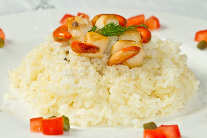 Risotto with Grilled Scallops Stock Photo - Image of scallops, tomatoes ...