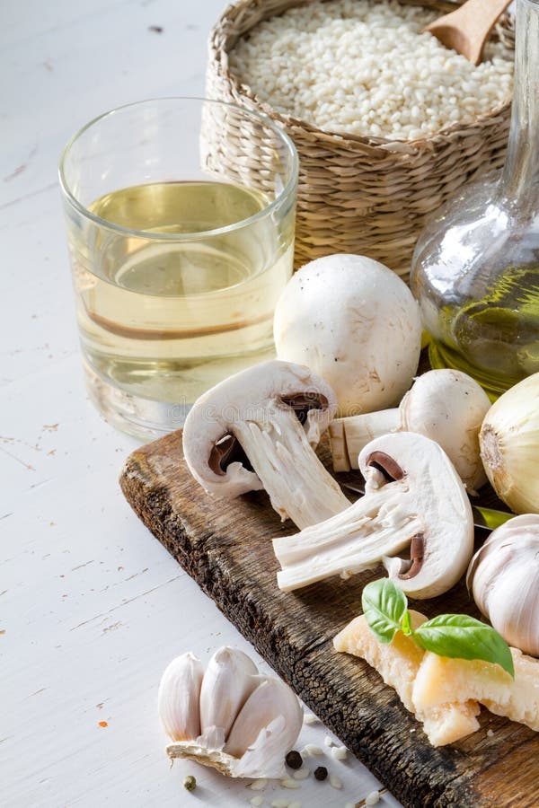 Risotto Ingredients on Wood Board Stock Photo - Image of uncooked, rice ...