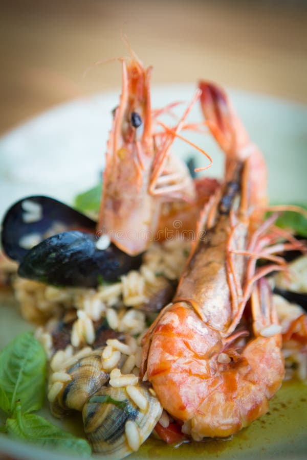 Risotto with Mussels, Prawns and Seafood Stock Image - Image of ...
