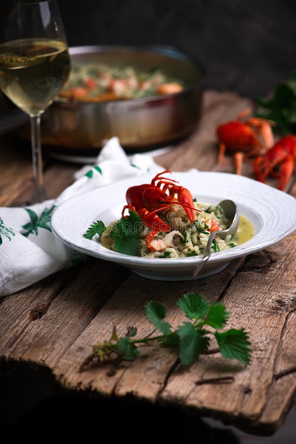 Risotto with Nettles and Crayfish.style Rustic Stock Image - Image of ...