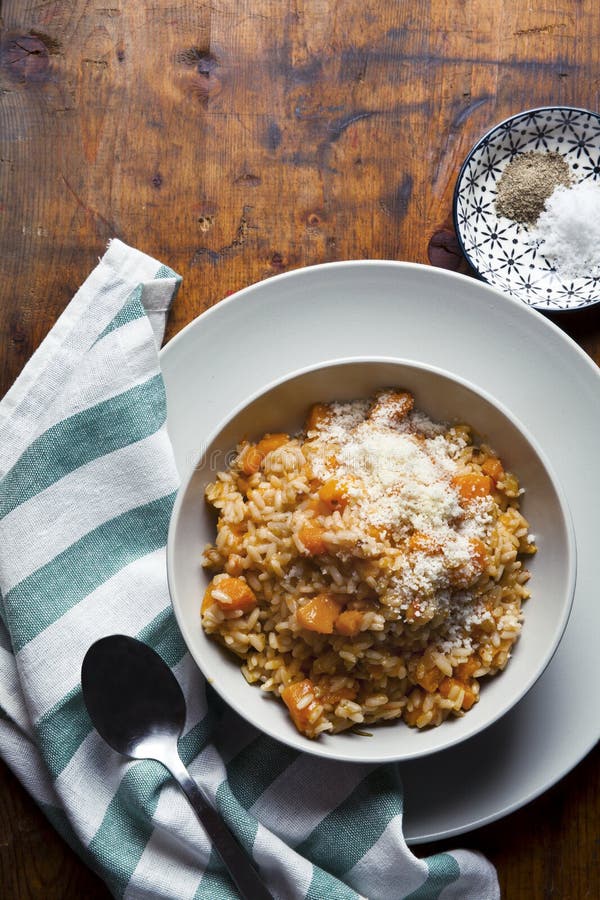Risotto with Pumpkin on a Wooden Stock Photo - Image of italian ...