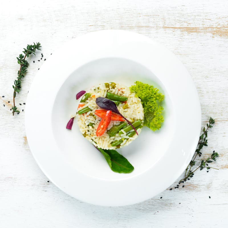 Risotto. Rice with Vegetables in a Plate. Top View Stock Image - Image ...