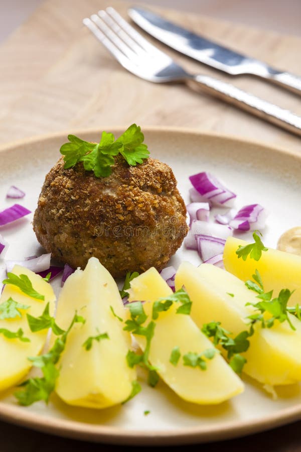 Rissole with Cooked Potatoes Stock Photo - Image of knife, fried: 208334010