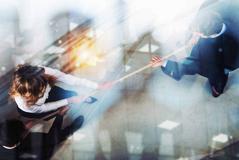 Rival Business Man and Woman Compete for the Command by Pulling the ...