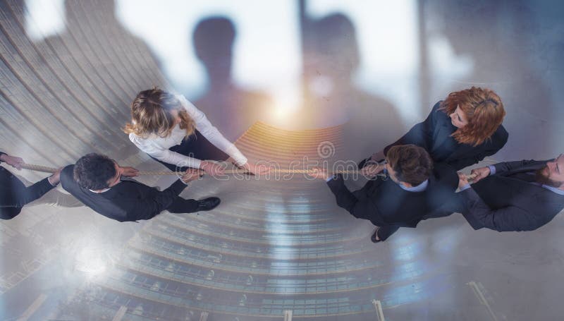 Rival Business Man and Woman Compete for the Command by Pulling the ...