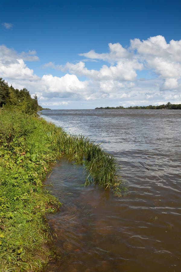 River bank stock image. Image of leaves, clouds, reflection - 15900119
