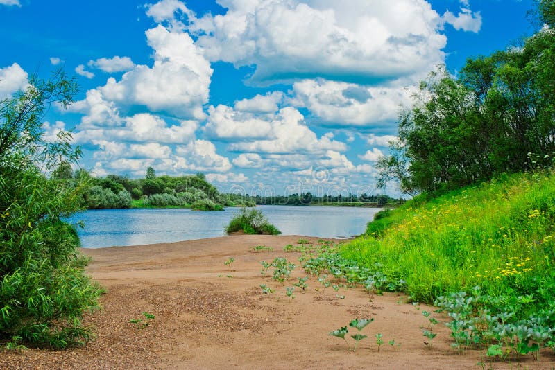 River beach stock photo. Image of green, waterfront, cloud - 29177412