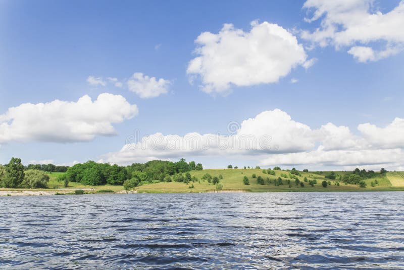 River Behind Which the Hill is Covered with Trees Stock Photo - Image ...