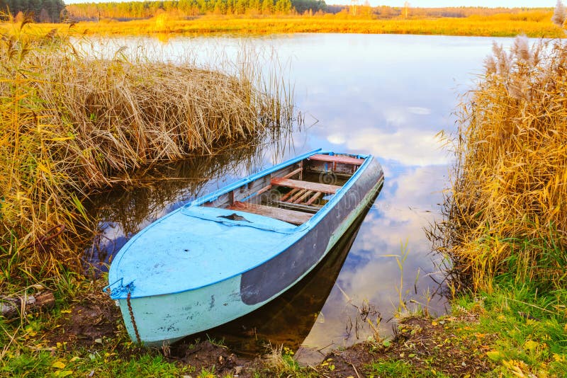 River and Blue Rowing Boat stock image. Image of beauty - 45984791