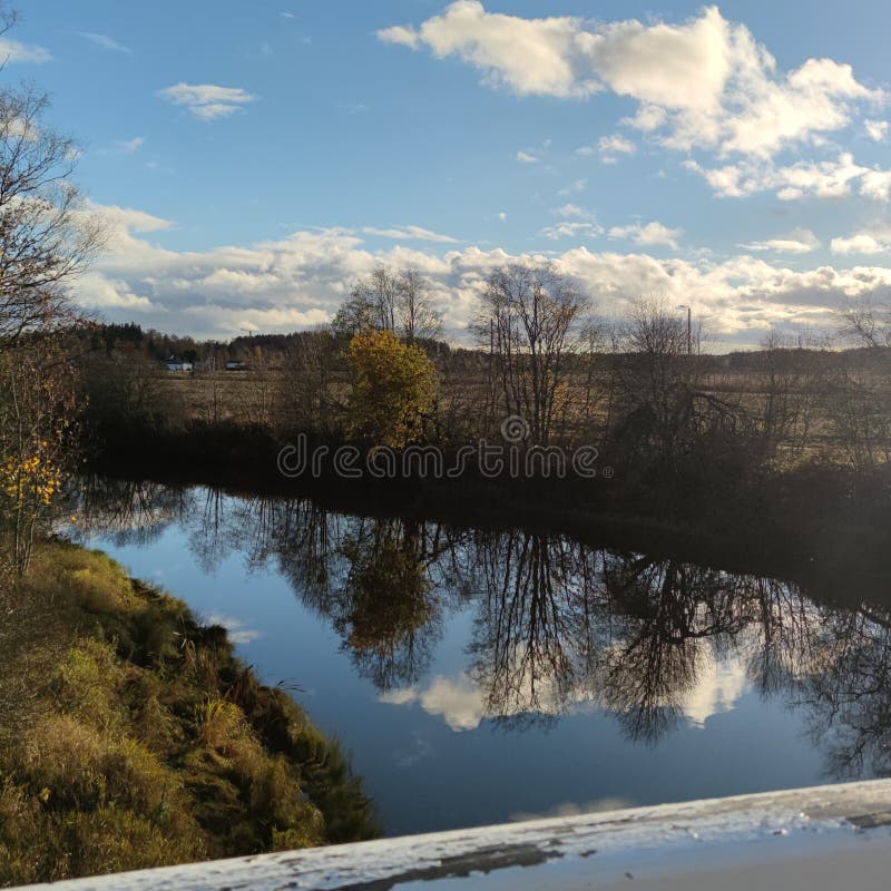 A river with blue sky stock image. Image of river, nature - 265944183