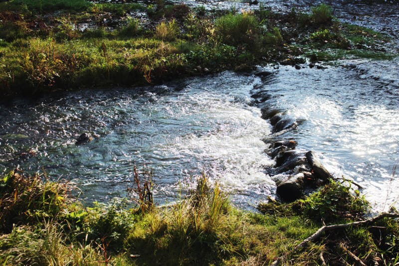 River Blue Water Stream Running among Two Banks Stock Image - Image of ...