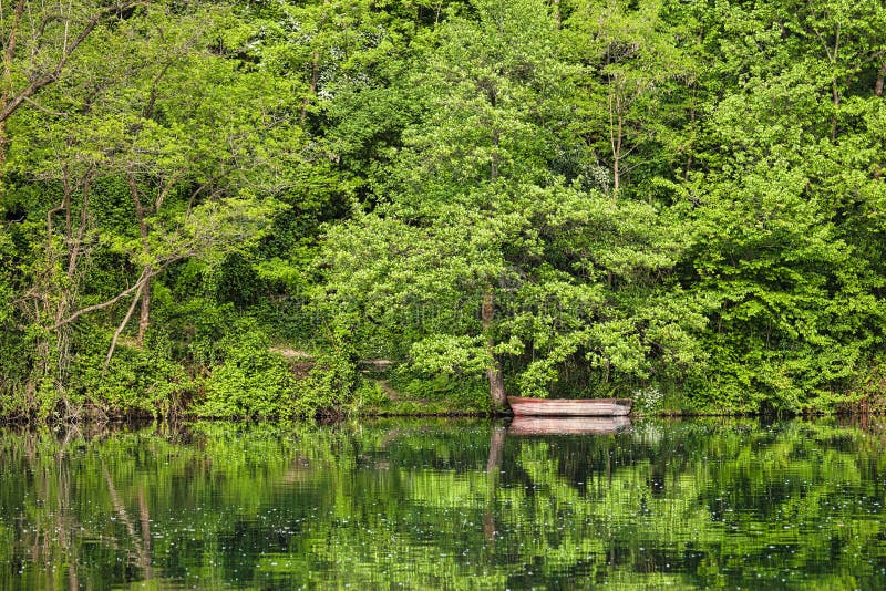 River, Boat and Green Trees on Water Refection Stock Photo - Image of ...