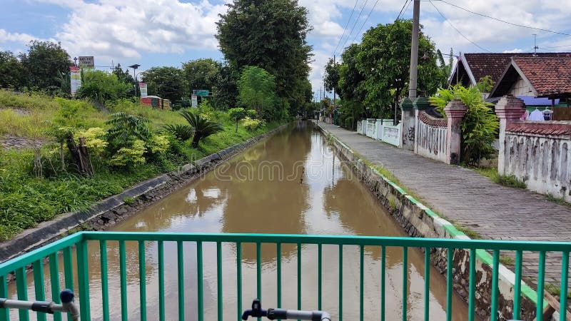 River Brown Water in Side of the Road Stock Image - Image of water ...