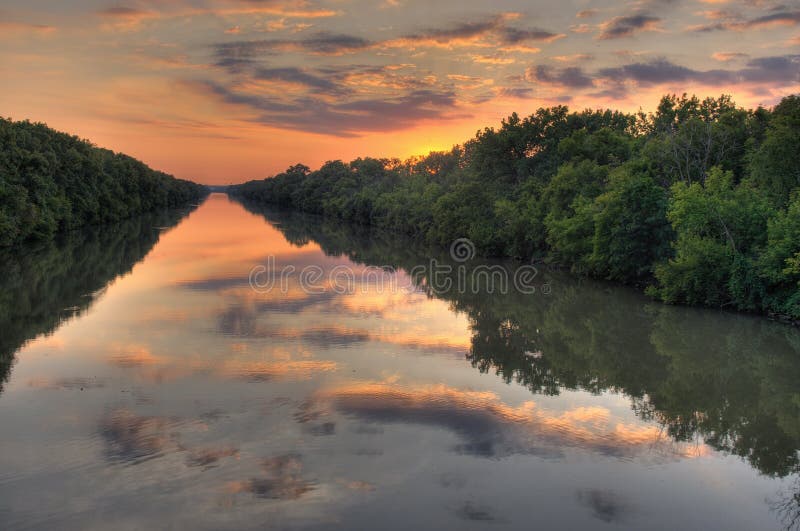 River cloud reflections stock image. Image of channel - 12117399